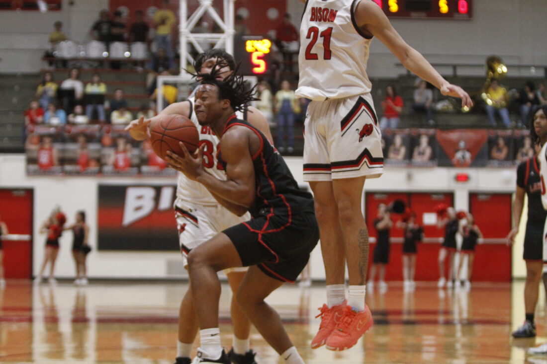 Lawrence girls survive late push to win, boys lose in basketball games ...